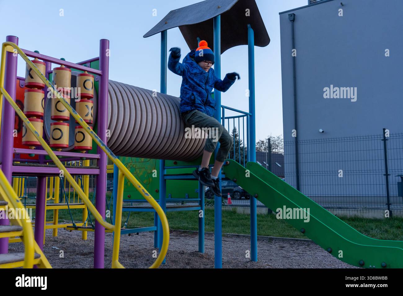 Child in green jacket hi-res stock photography and images - Alamy