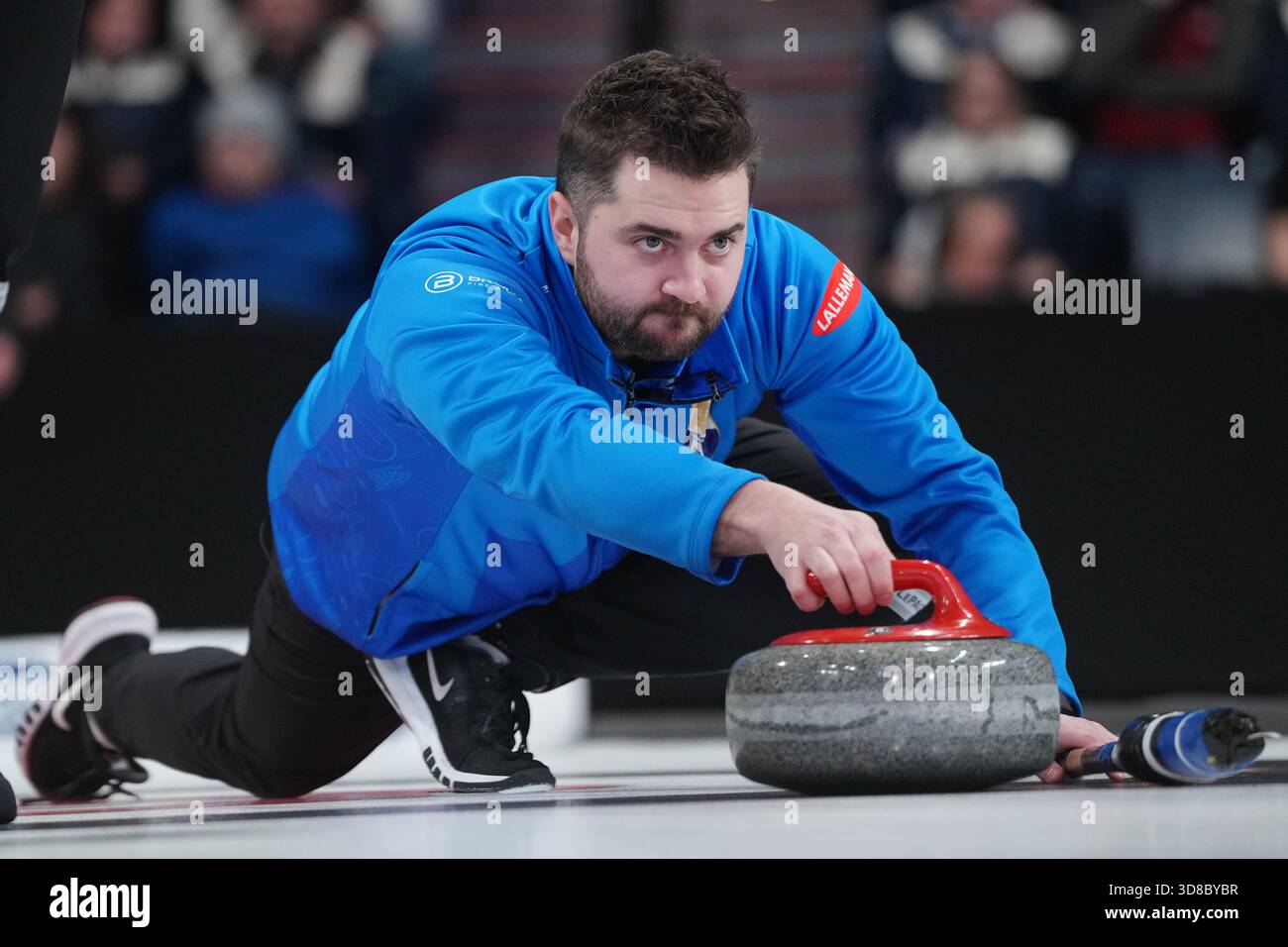 Team Dunstone skip Matt Dunstone throws a rock during Canadian Olympic ...