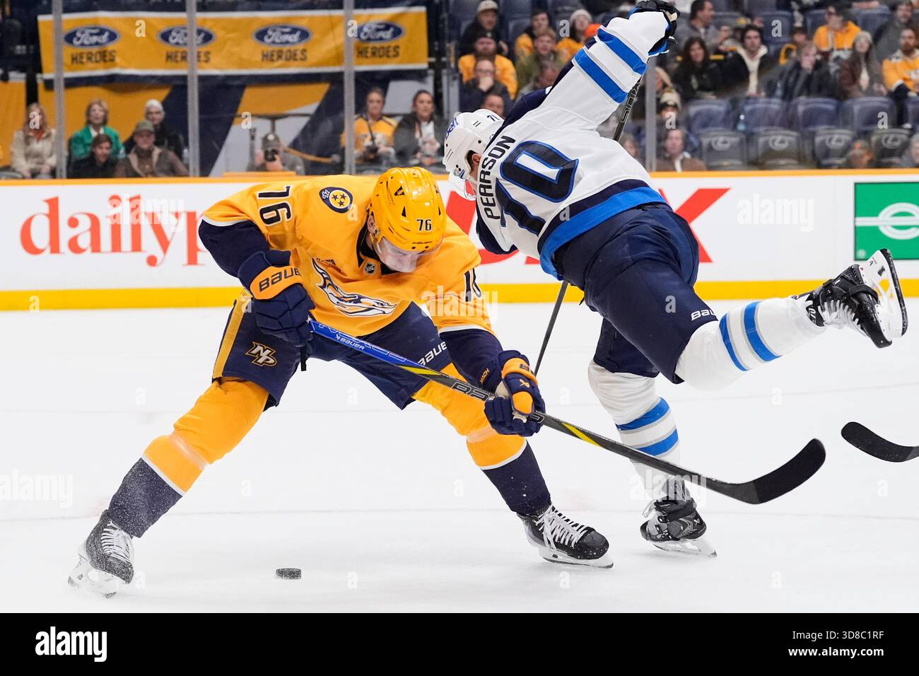 Winnipeg Jets left wing Tanner Pearson (70) moves the puck past ...