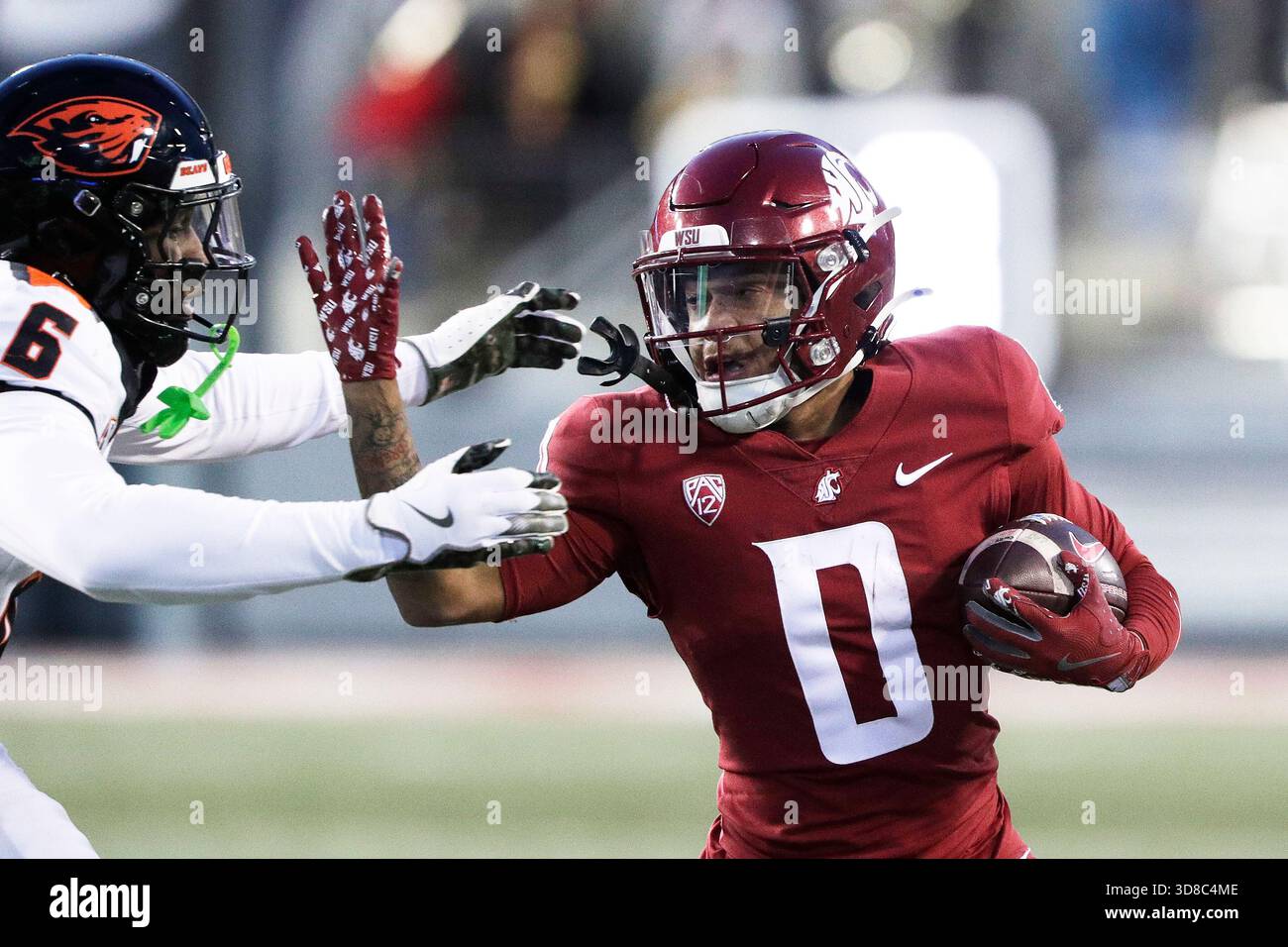 Washington State wide receiver Tony Freeman (0) carries the ball while ...
