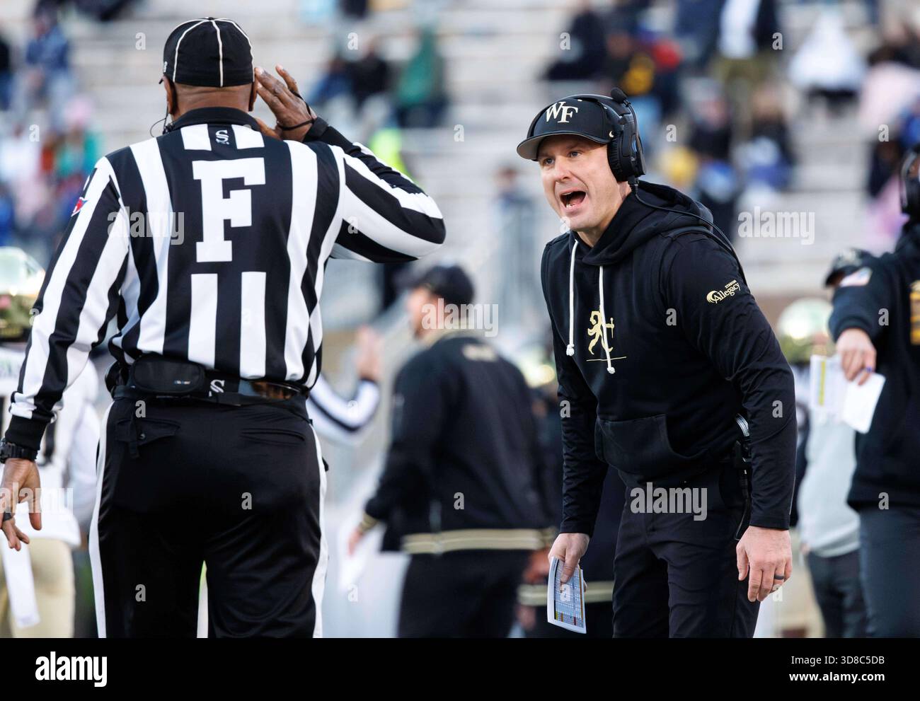 Wake Forest head coach Jake Dickert shouts at an official during the ...