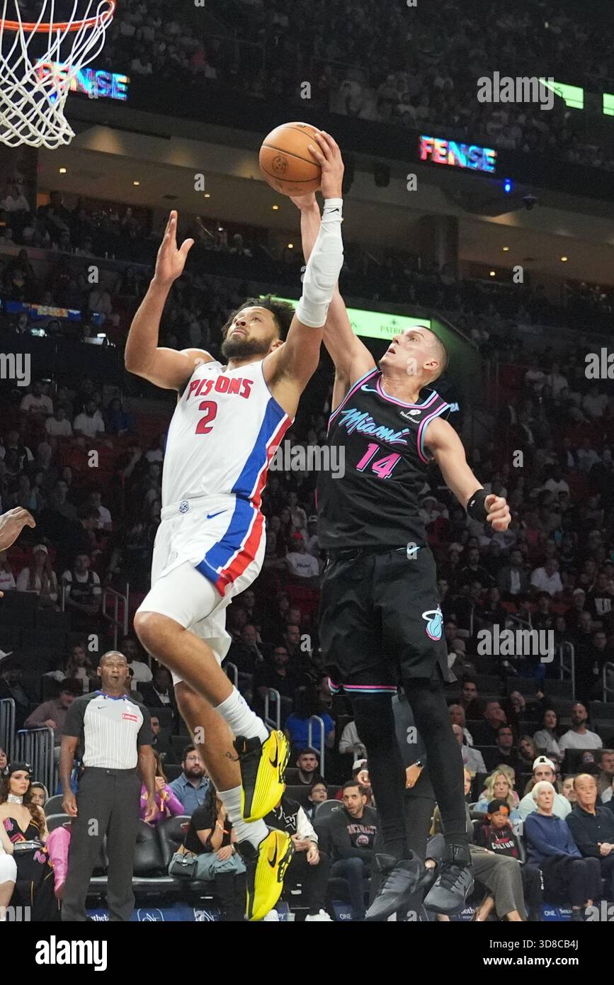 Detroit Pistons guard Cade Cunningham (2) drives to the basket as Miami Heat guard Tyler Herro ...