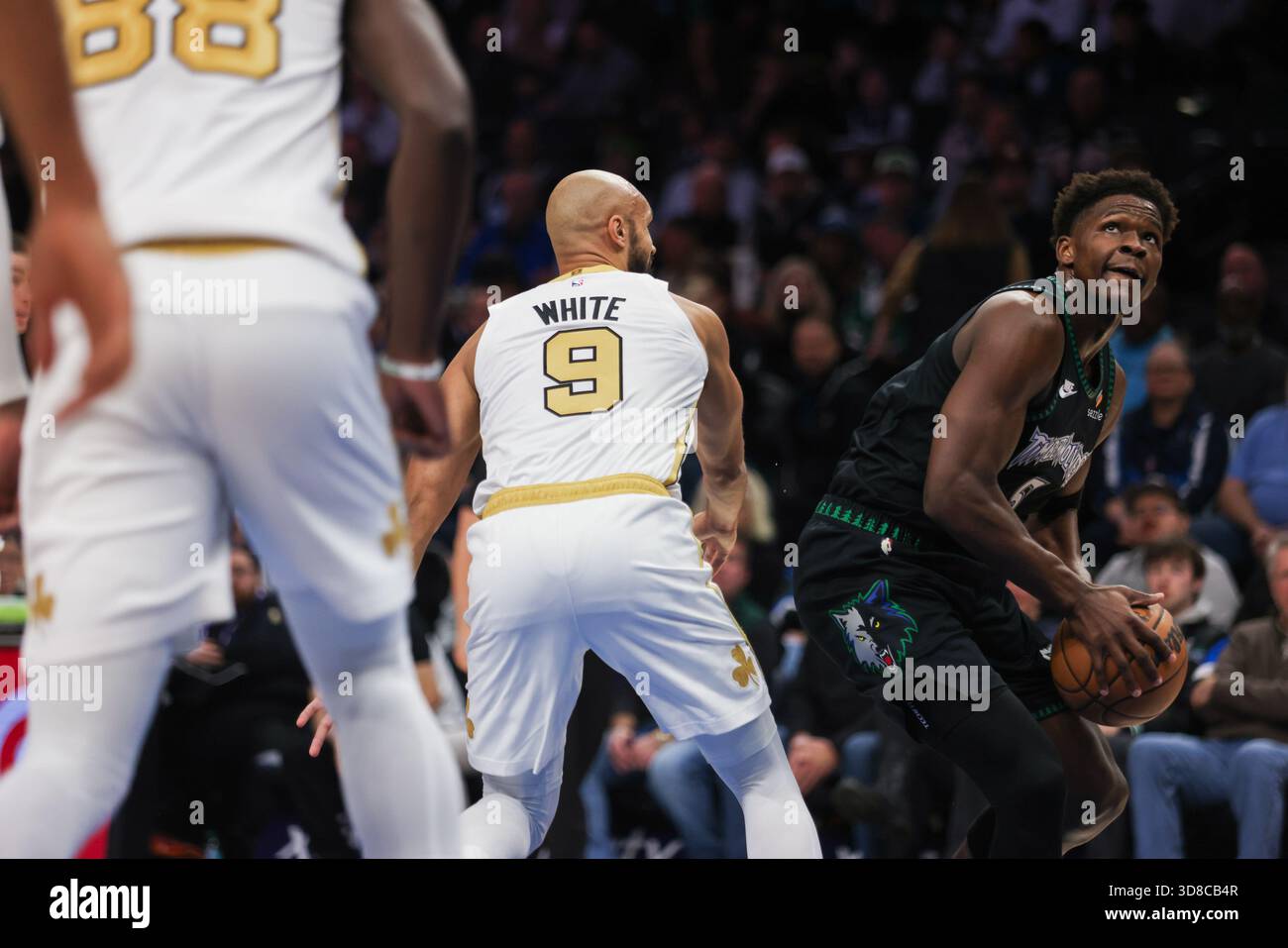 Minnesota Timberwolves' Anthony Edwards, right, avoids defense from ...