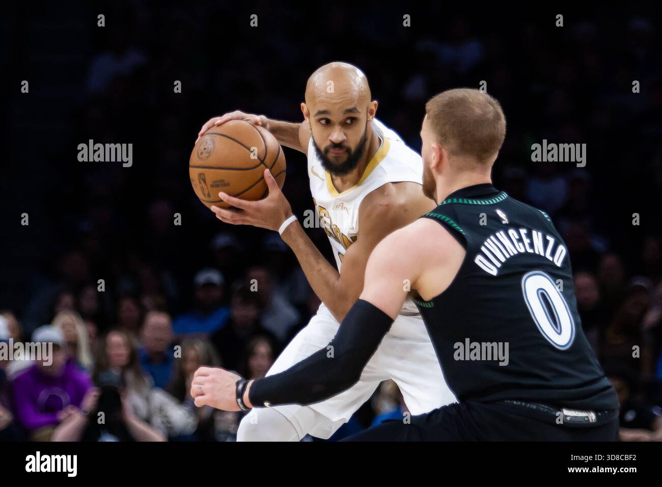 Minnesota Timberwolves' Donte DiVincenzo (0) defends against Boston ...