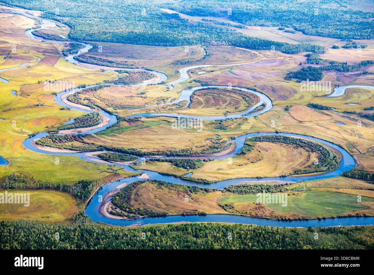 Aerial view of winding rivers and fertile wetlands in the Nanweng River ...