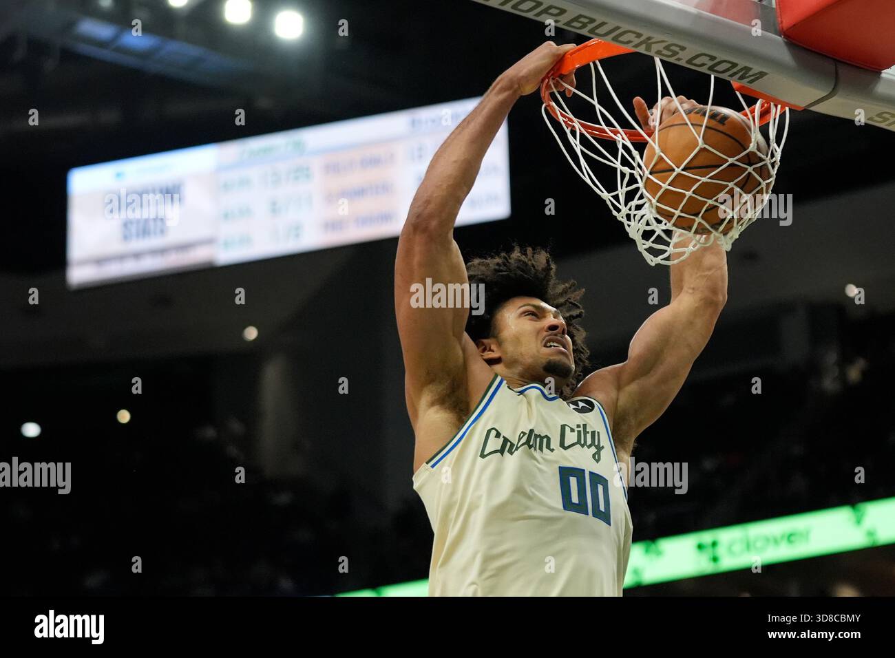 Milwaukee Bucks' Jericho Sims dunks during the first half of an NBA ...