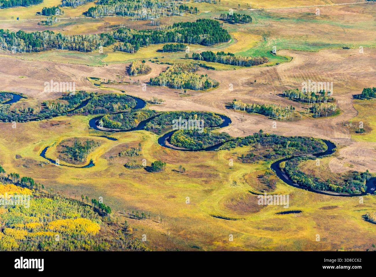 Aerial view of winding rivers and fertile wetlands in the Nanweng River ...