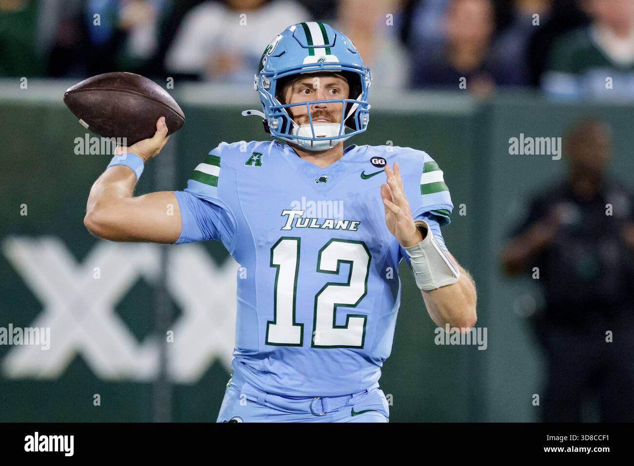 Tulane quarterback Jake Retzlaff (12) throws during the first half of ...