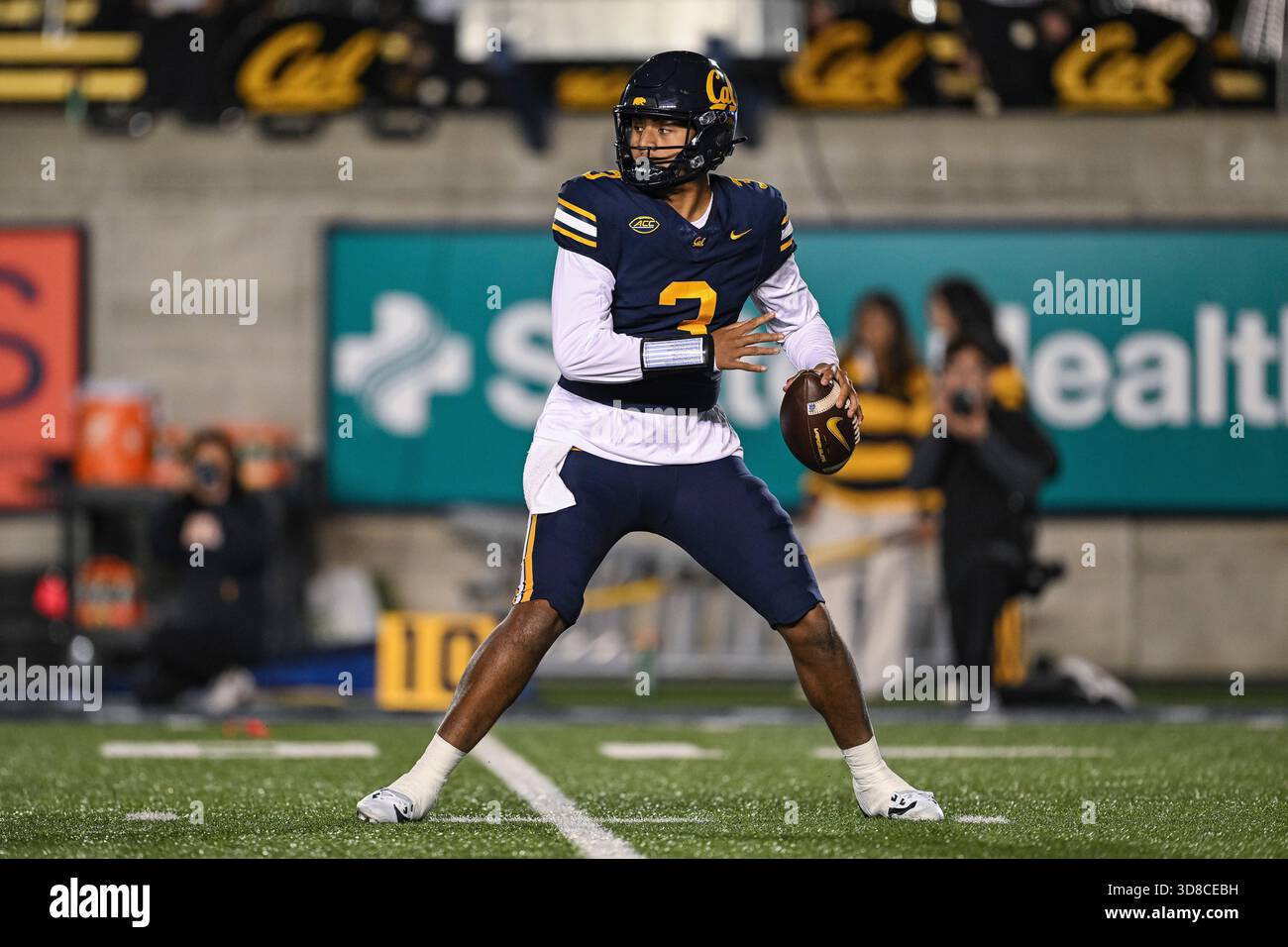 California quarterback Jaron-Keawe Sagapolutele looks to throw the ball ...