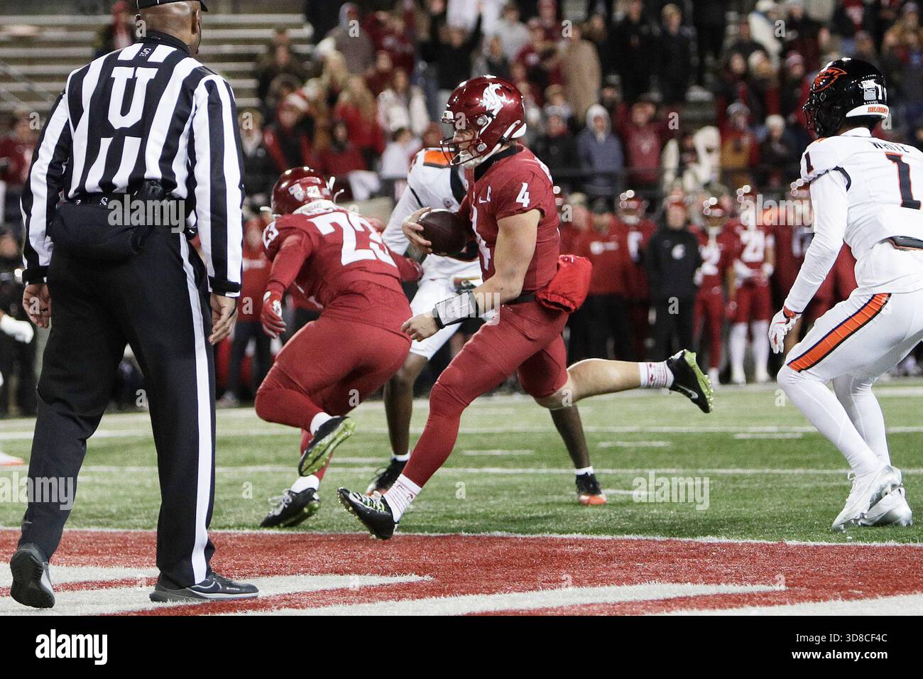 Washington State quarterback Zevi Eckhaus (4) runs for a touchdown ...