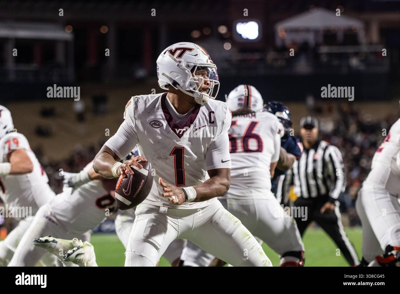 Virginia Tech quarterback Kyron Drones (1) looks to pass the ball from ...