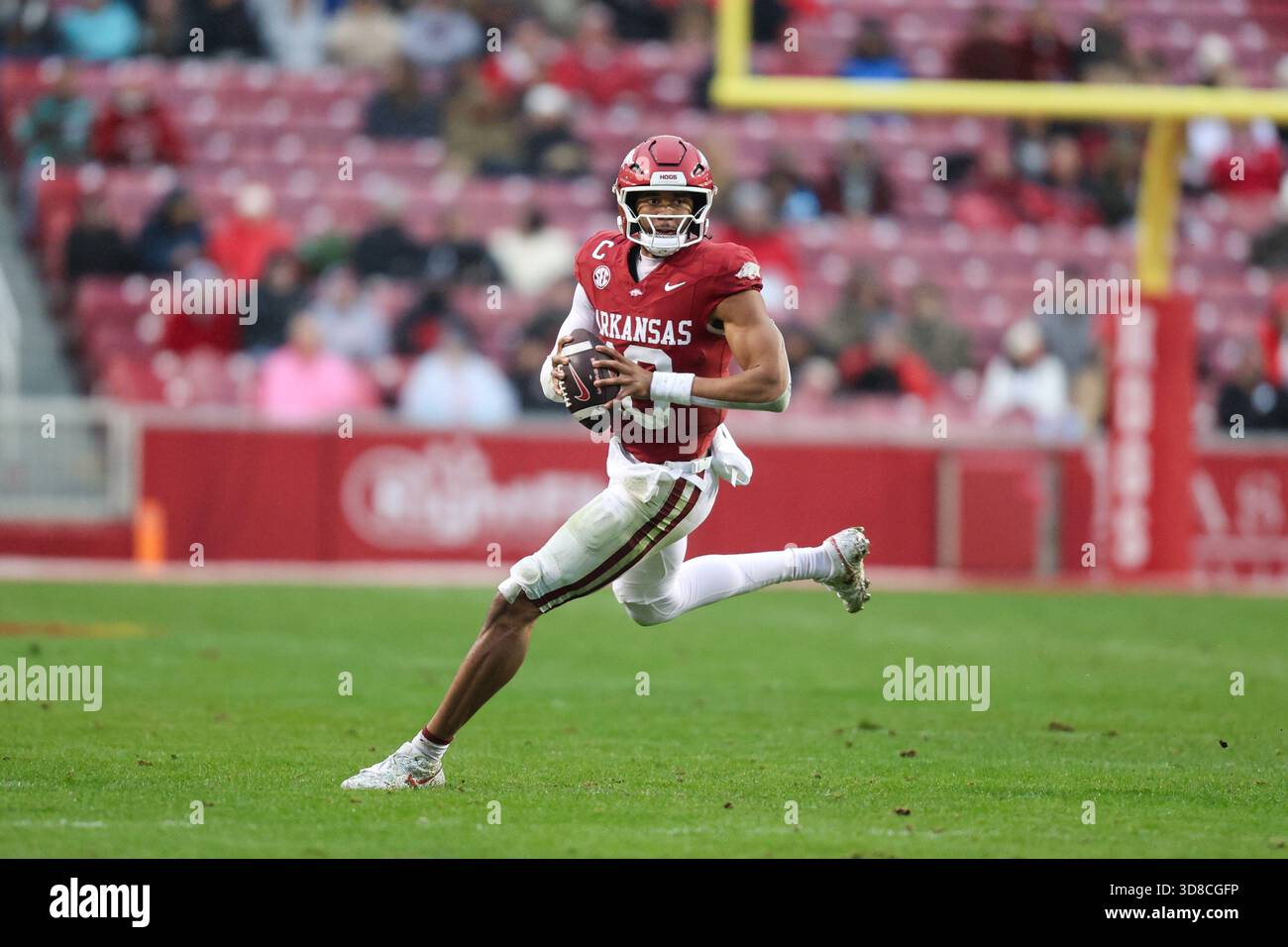November 29, 2025: Hogs quarterback Taylen Green (10) rolls out looking ...