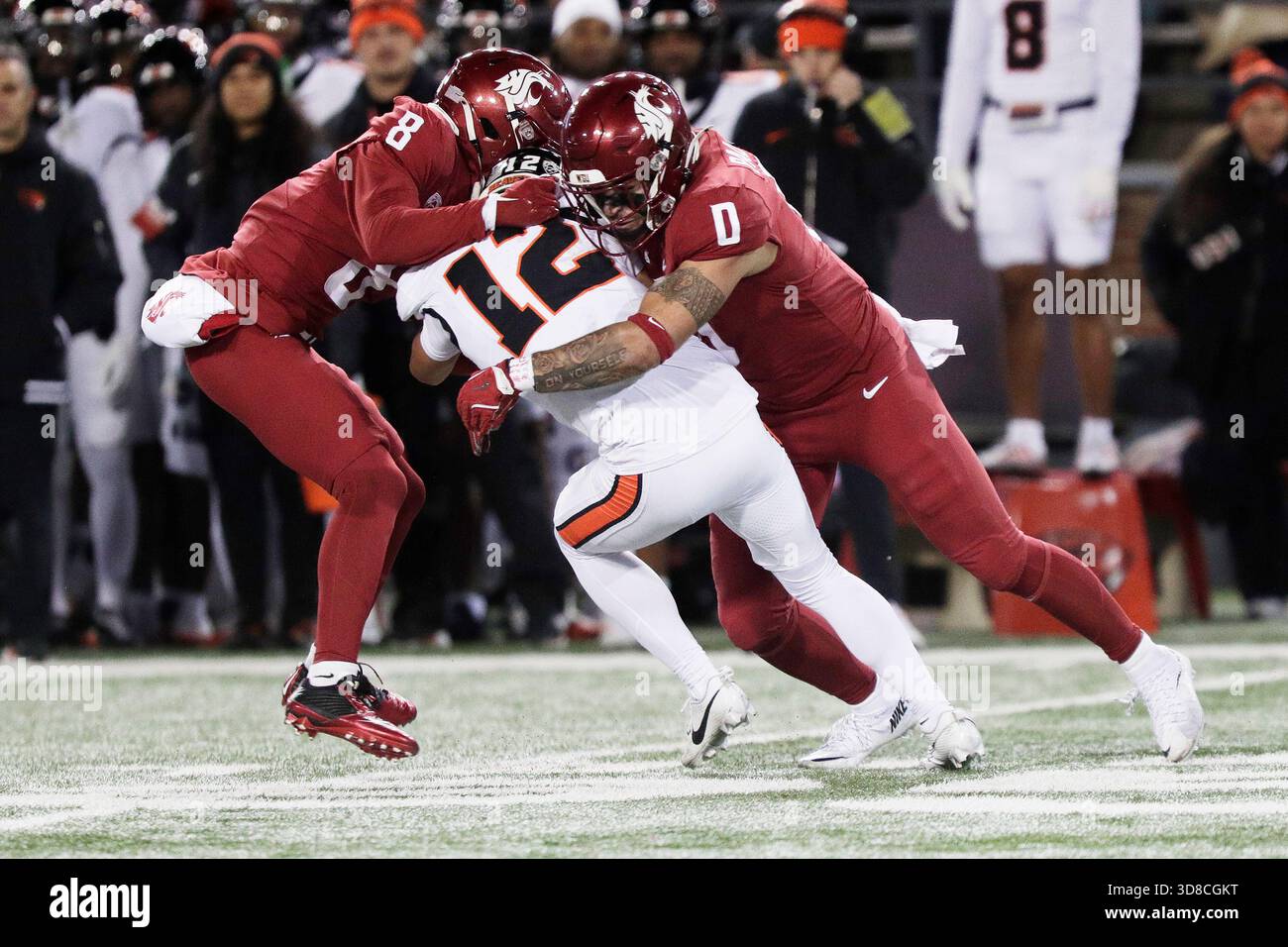 Washington State defensive back Kenny Worthy III (8) and linebacker ...