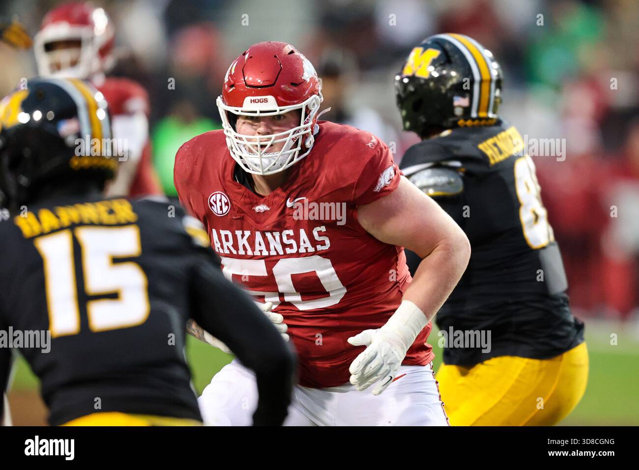 November 29, 2025: Arkansas right guard Kobe Branham (50) works along ...