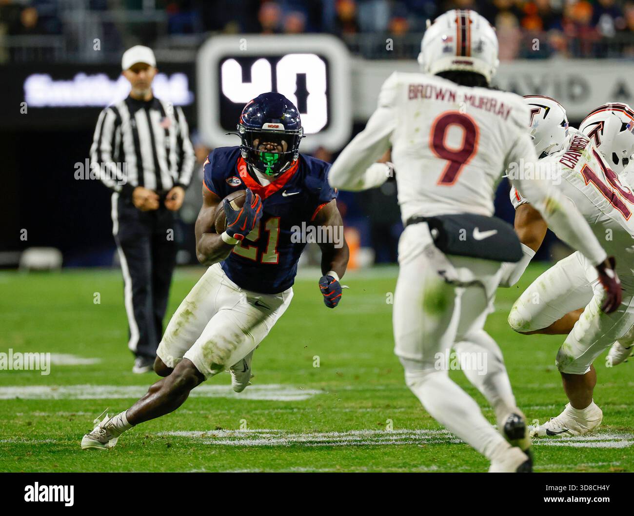 November 29, 2025: Virginia Cavaliers RB #21 Harrison Waylee runs with ...