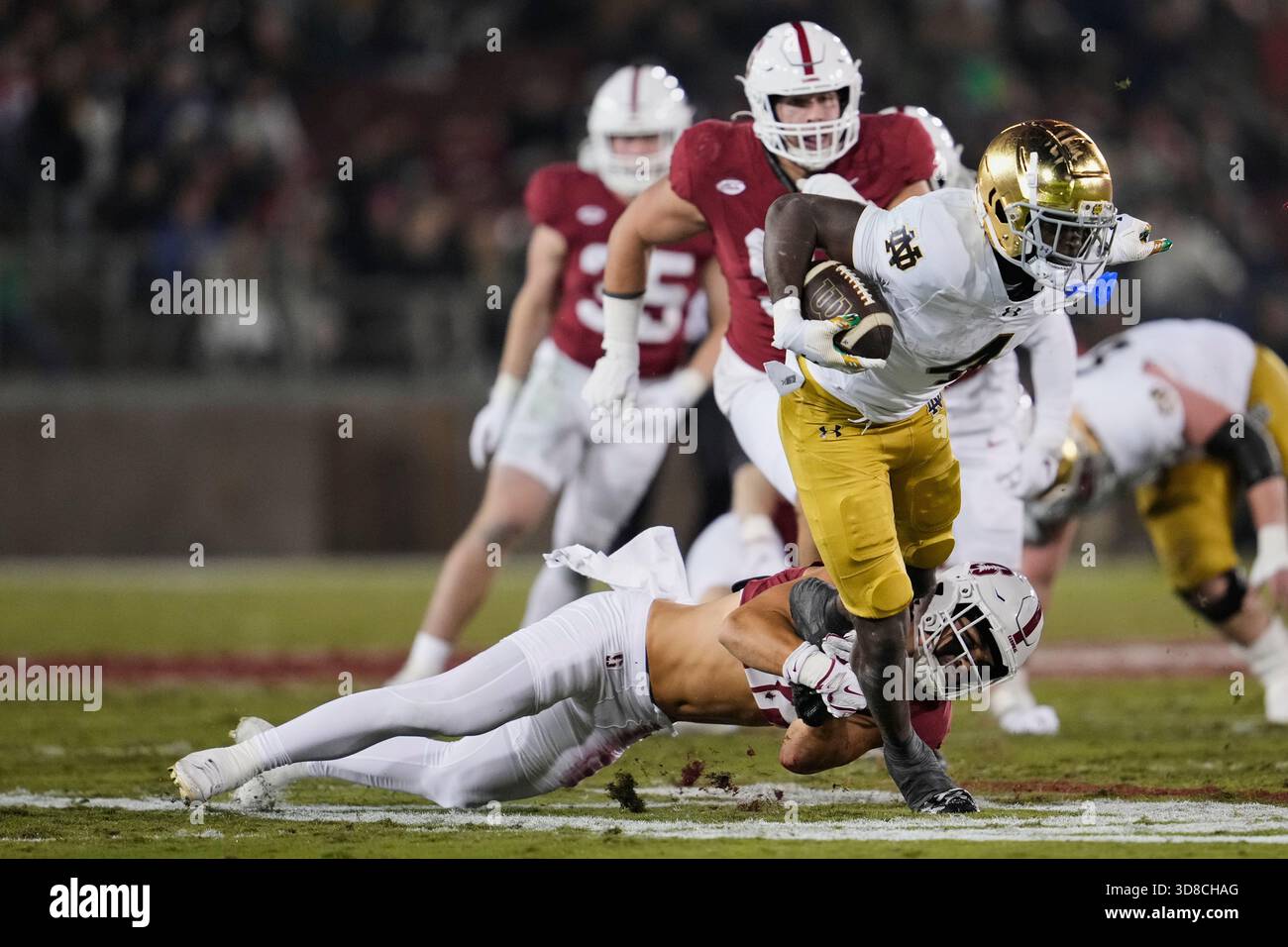 Notre Dame running back Jeremiyah Love (4) is tackled by Stanford ...