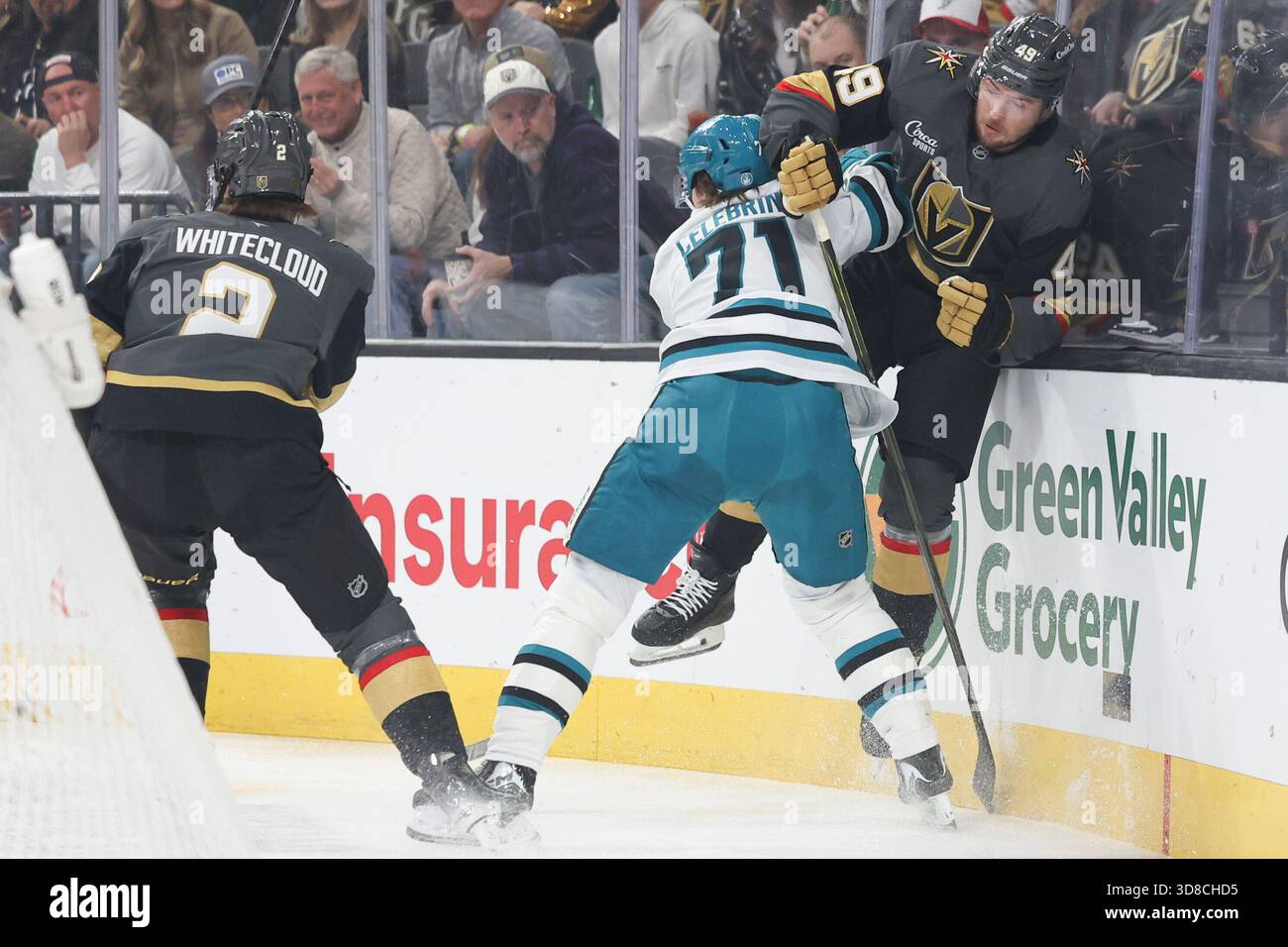 San Jose Sharks center Macklin Celebrini (71) checks Vegas Golden Knights left wing Ivan ...