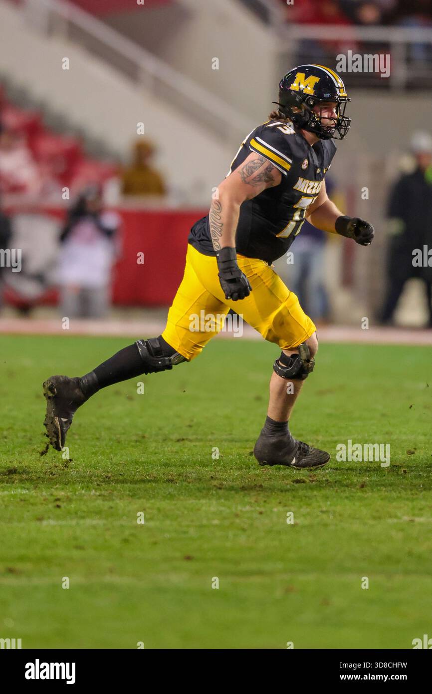 November 29, 2025: Missouri center Tristan Wilson (73) pulls along the ...