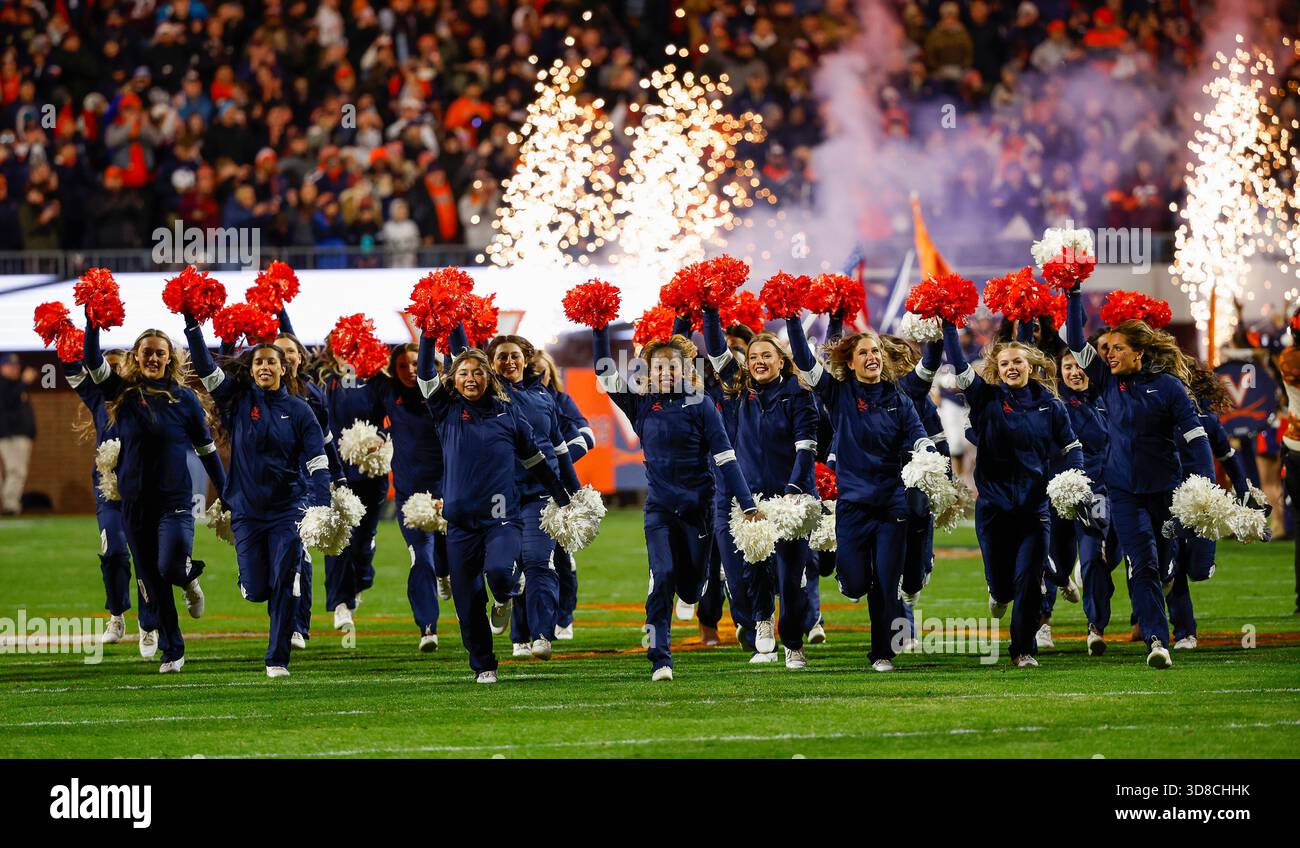 November 29, 2025: The Virginia cheerleaders run onto the field before ...