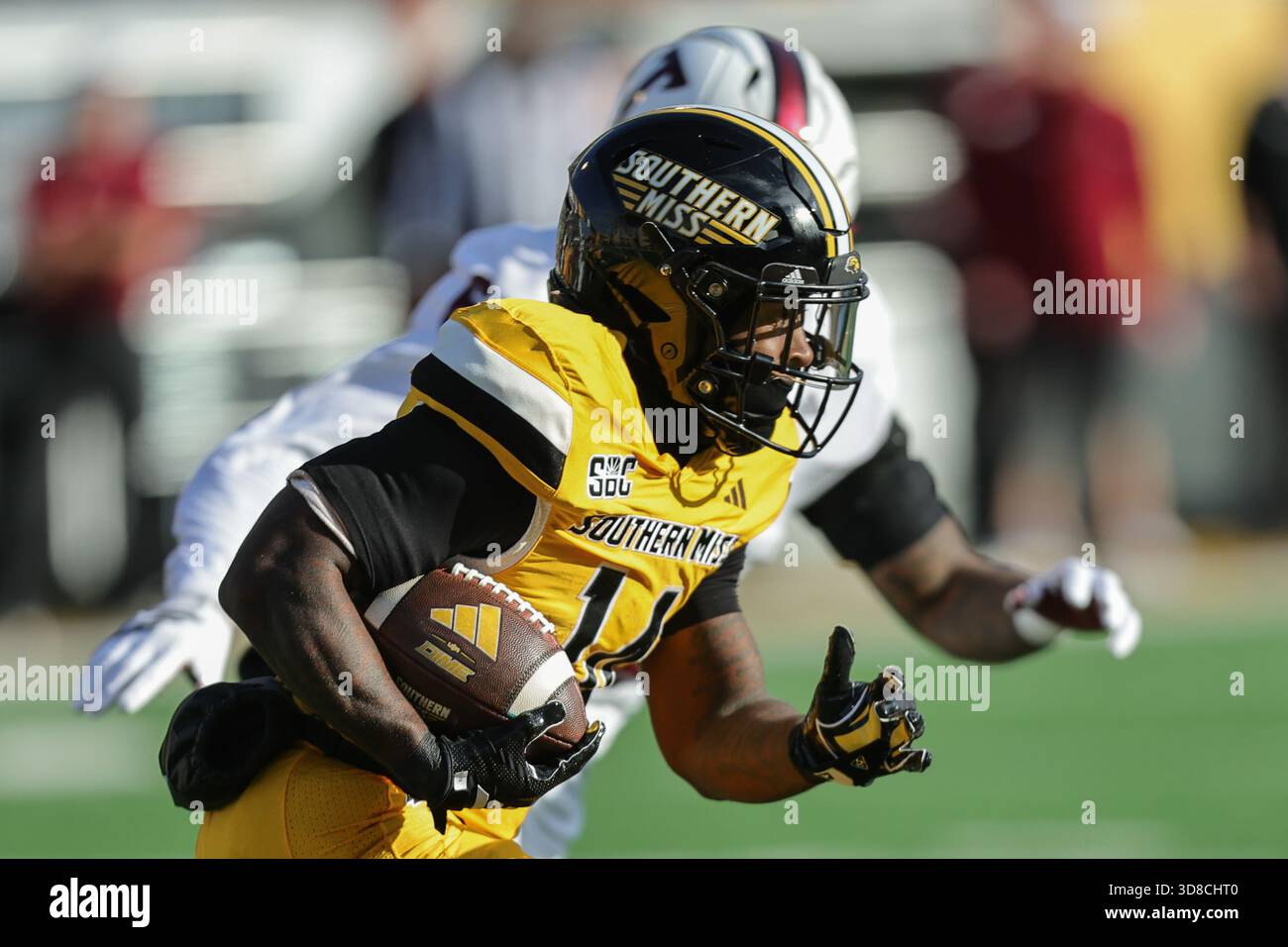 Nov 29, 2025: Southern Miss running back Robert Briggs (14) runs the ...