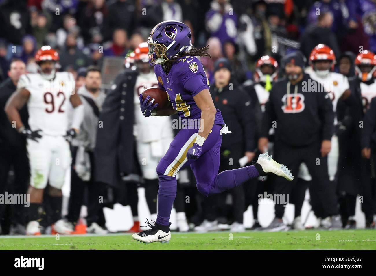 Baltimore Ravens running back Keaton Mitchell runs the ball for a ...