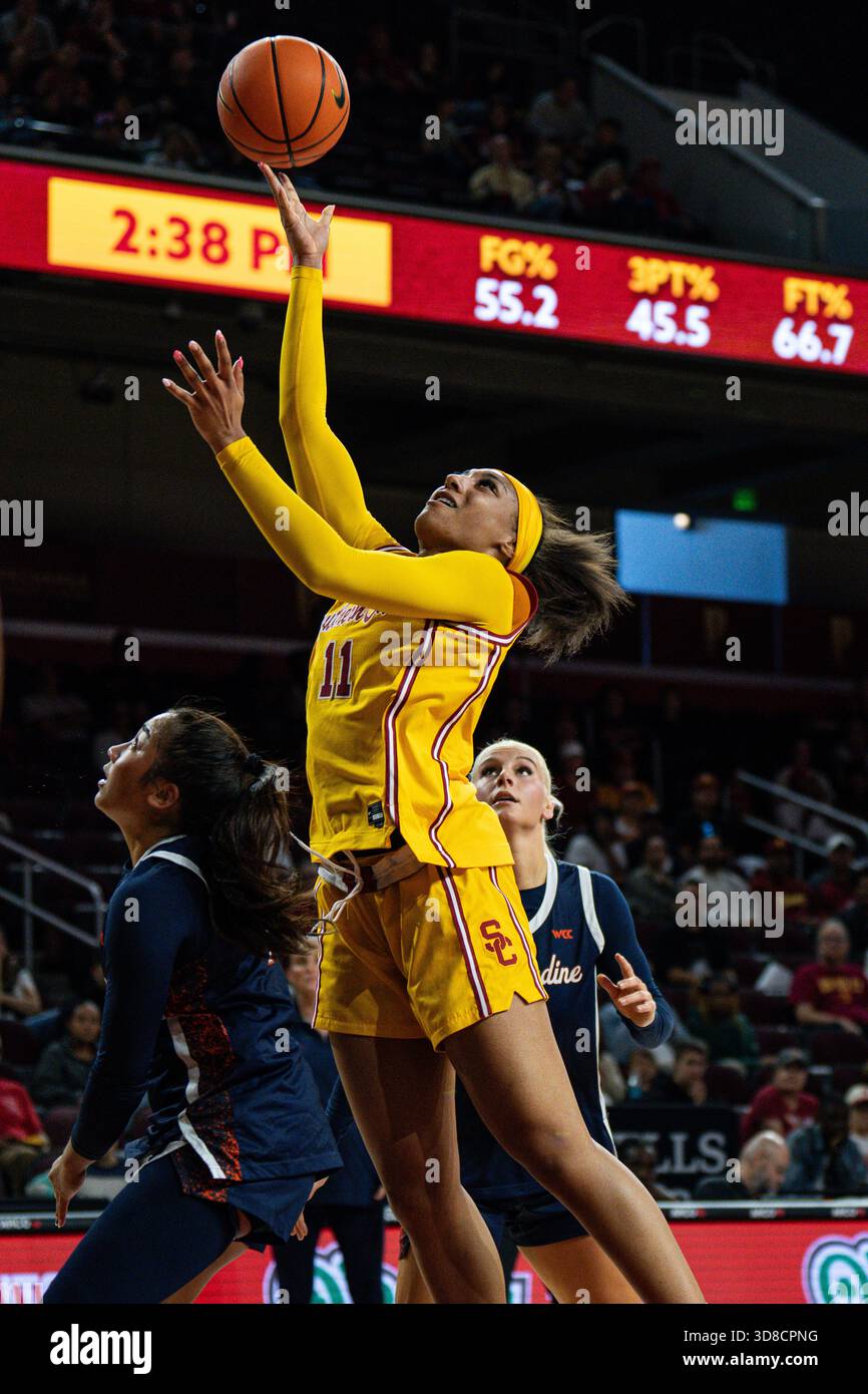 USC Trojans guard Kennedy Smith (11) scores during a NCAA women’s ...