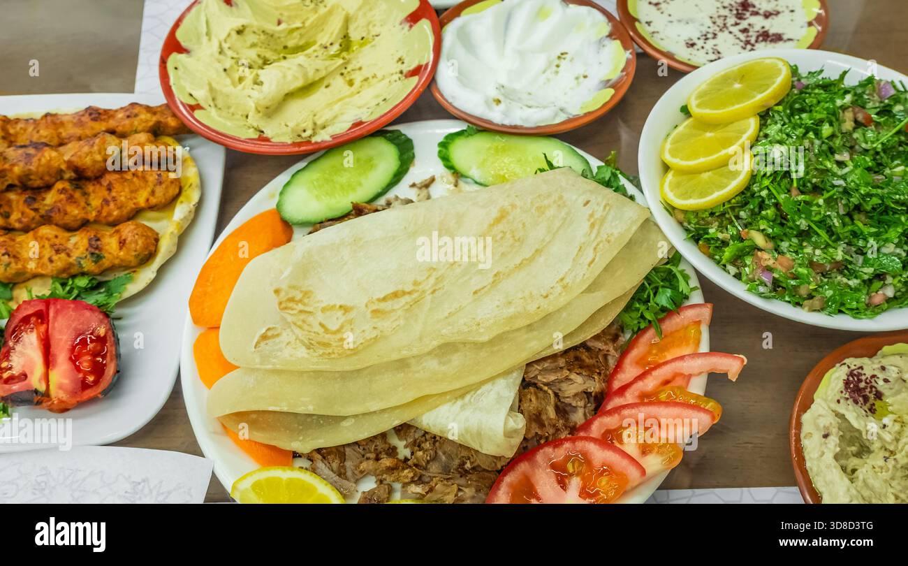 Traditional Middle eastern dishes on a table. Arabic Cuisine: Middle ...