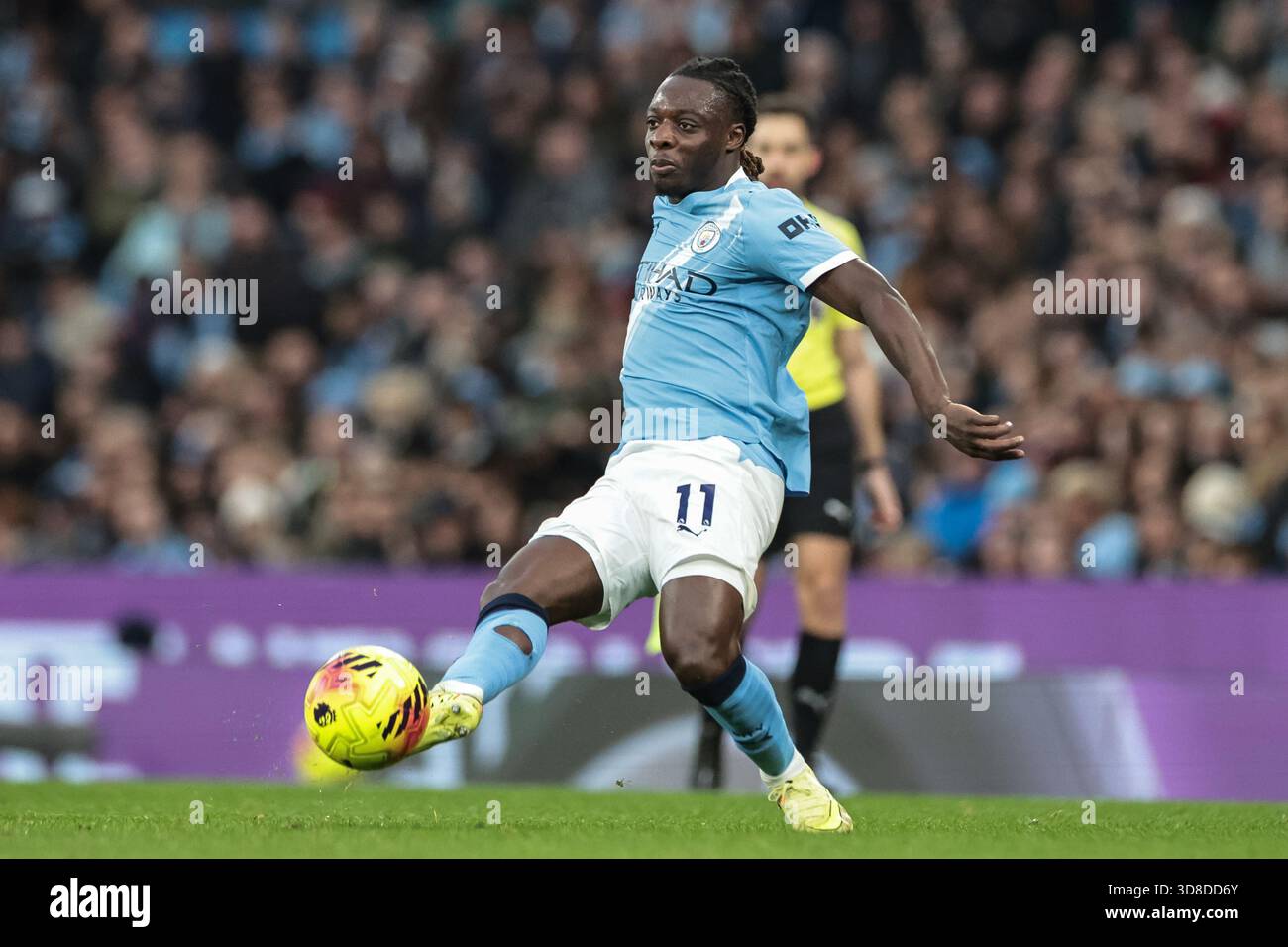 Jeremy Doku of Manchester City passes the ball during the Premier ...