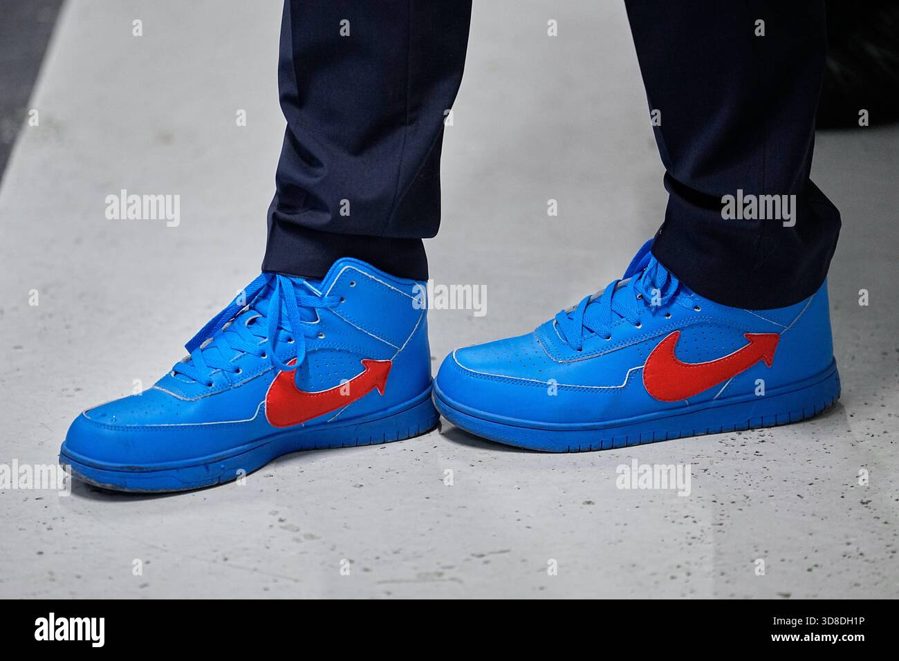 A party member wears sport shoes with the AfD logo during the re ...