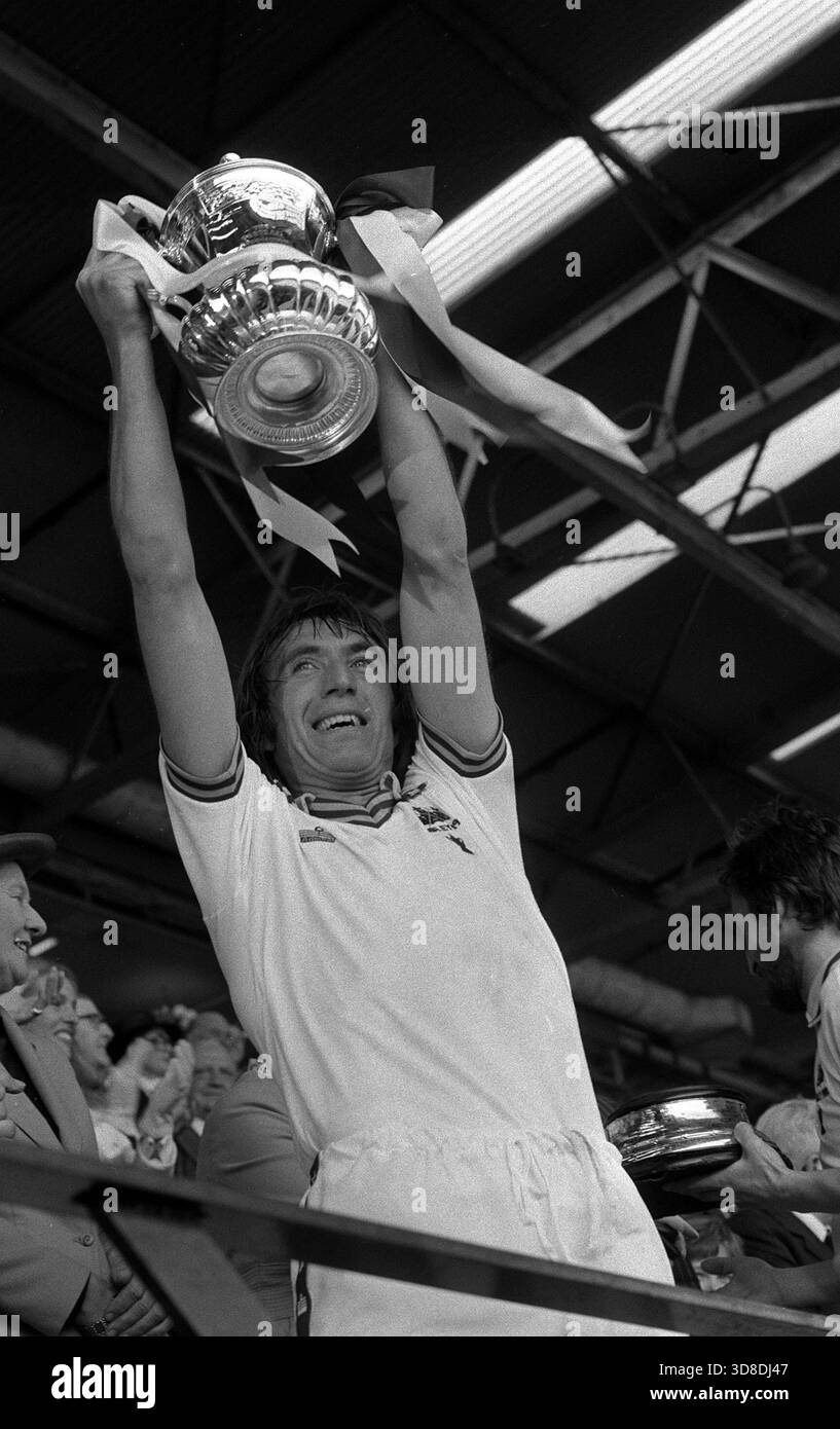 File photo dated 10-05-1980 of West Ham United captain Billy Bonds proudly holds aloft the FA ...