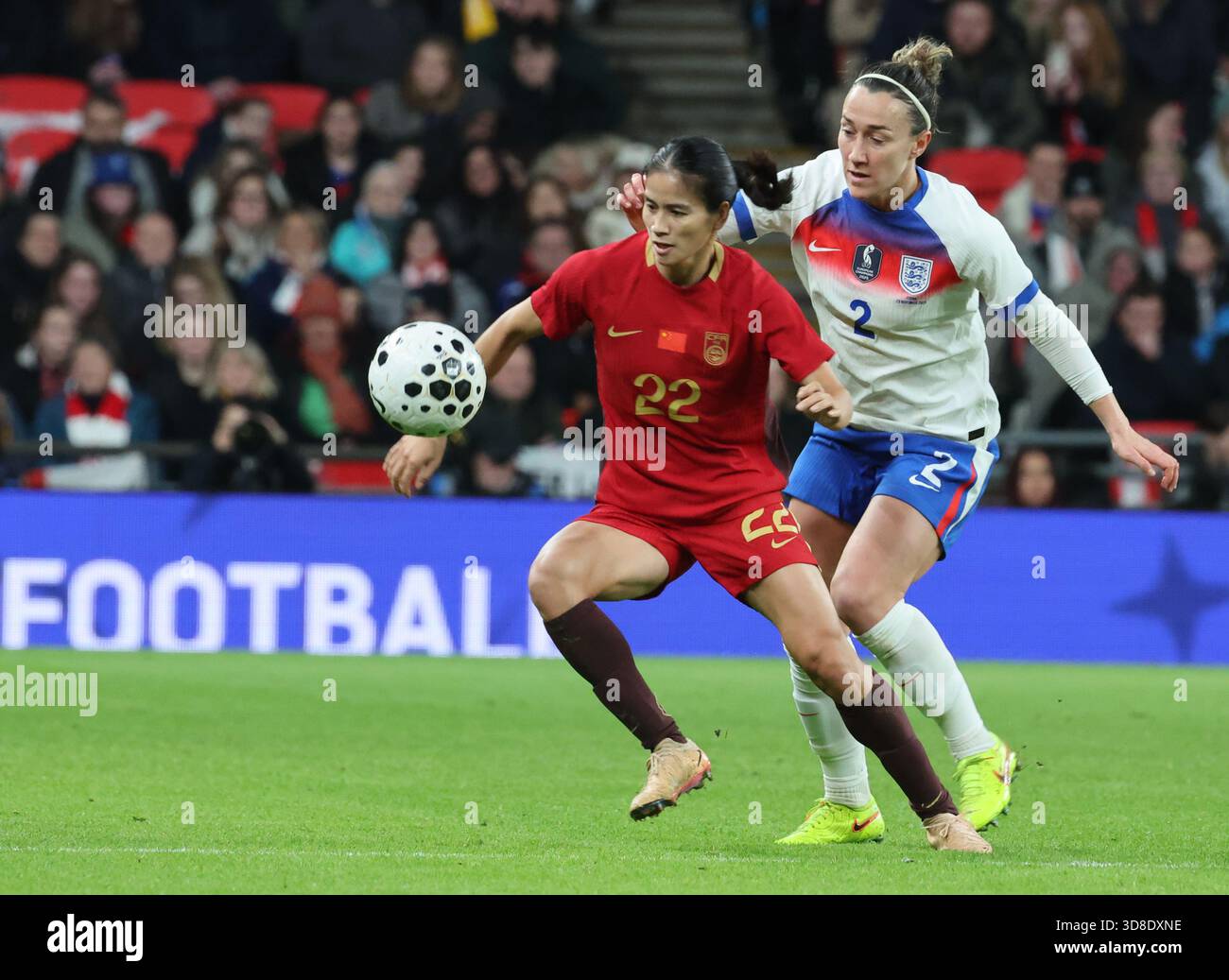 China's Chen Qiaozhu(Guangdong)and Lucy Bronze (Chelsea)of England ...