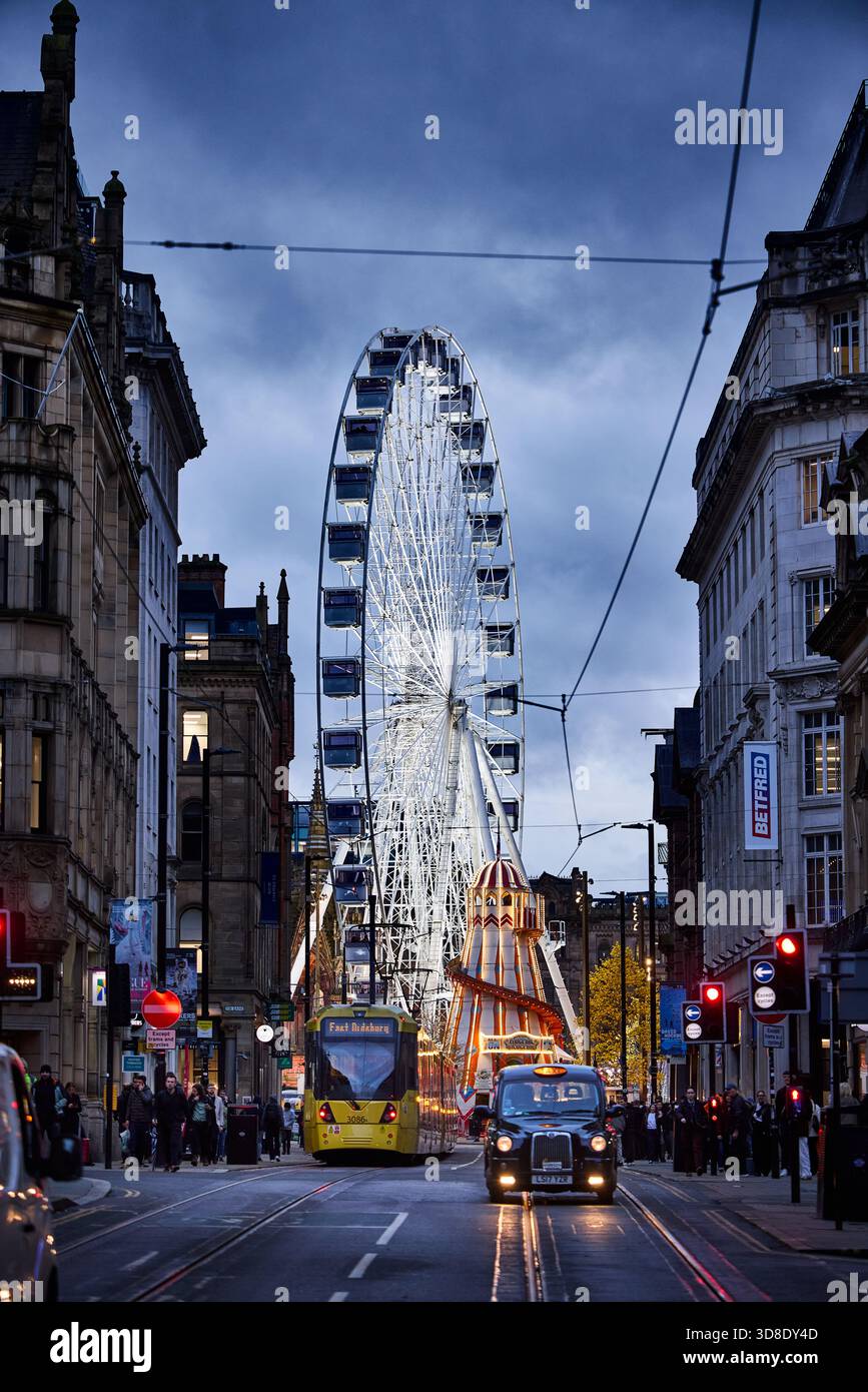 Manchester Metrolink tram on Cross Street in the city centre, with the ...