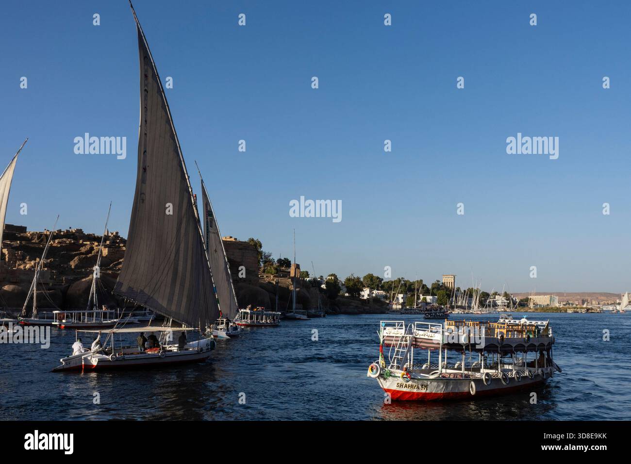 Felucca and boat on the Nile river, Aswan, Egypt Stock Photo - Alamy