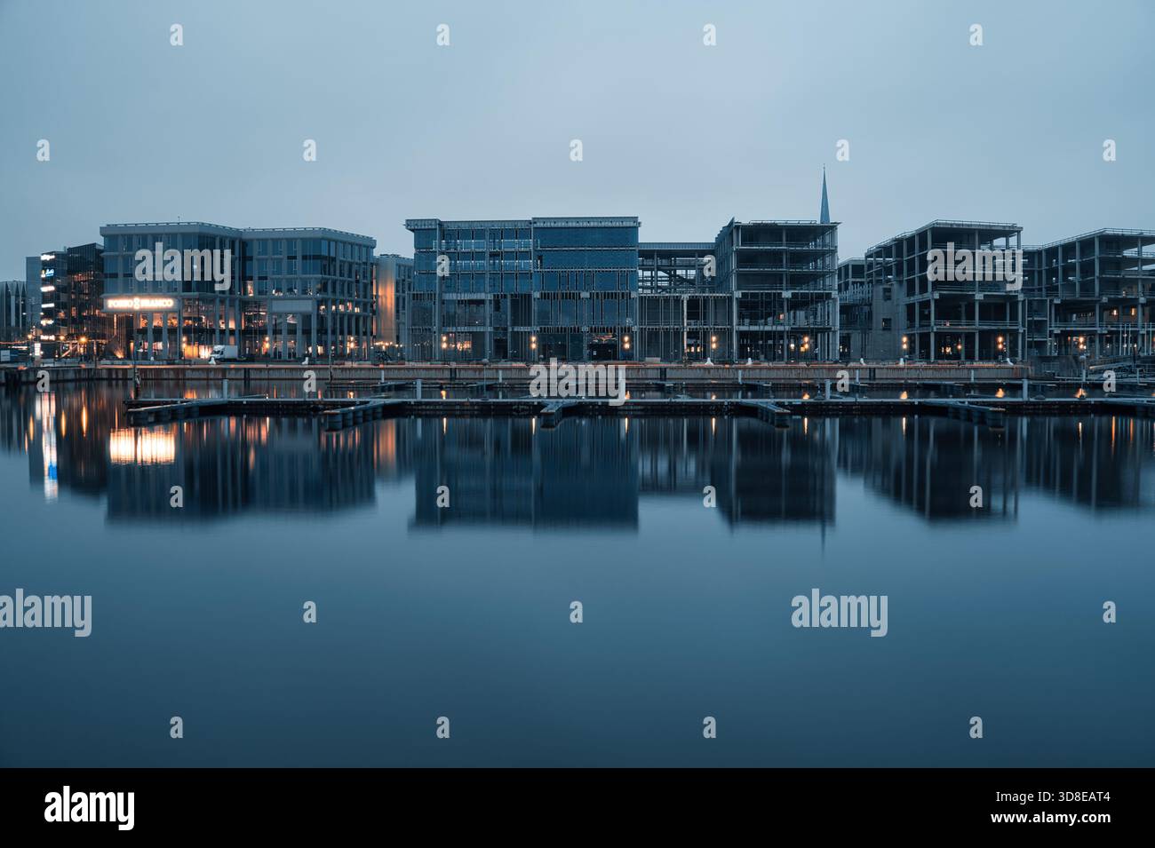 Modern Port Development Reflection at Dusk Stock Photo - Alamy