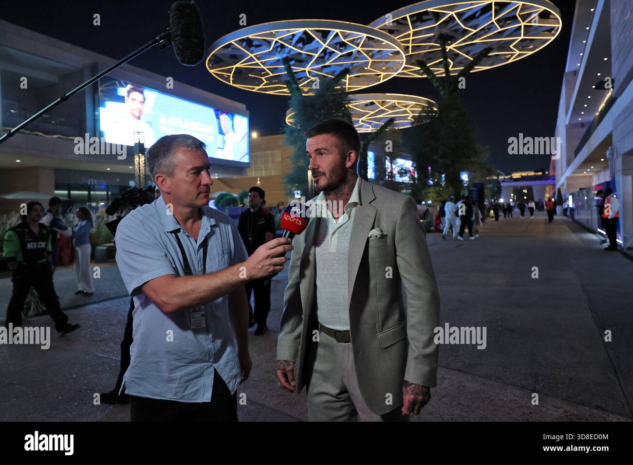 (L to R): Craig Slater (GBR) Sky Sports F1 Reporter with David Beckham ...