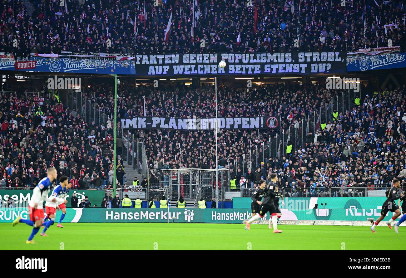 Fans supporters Stuttgart with a banner against the plans of the ...