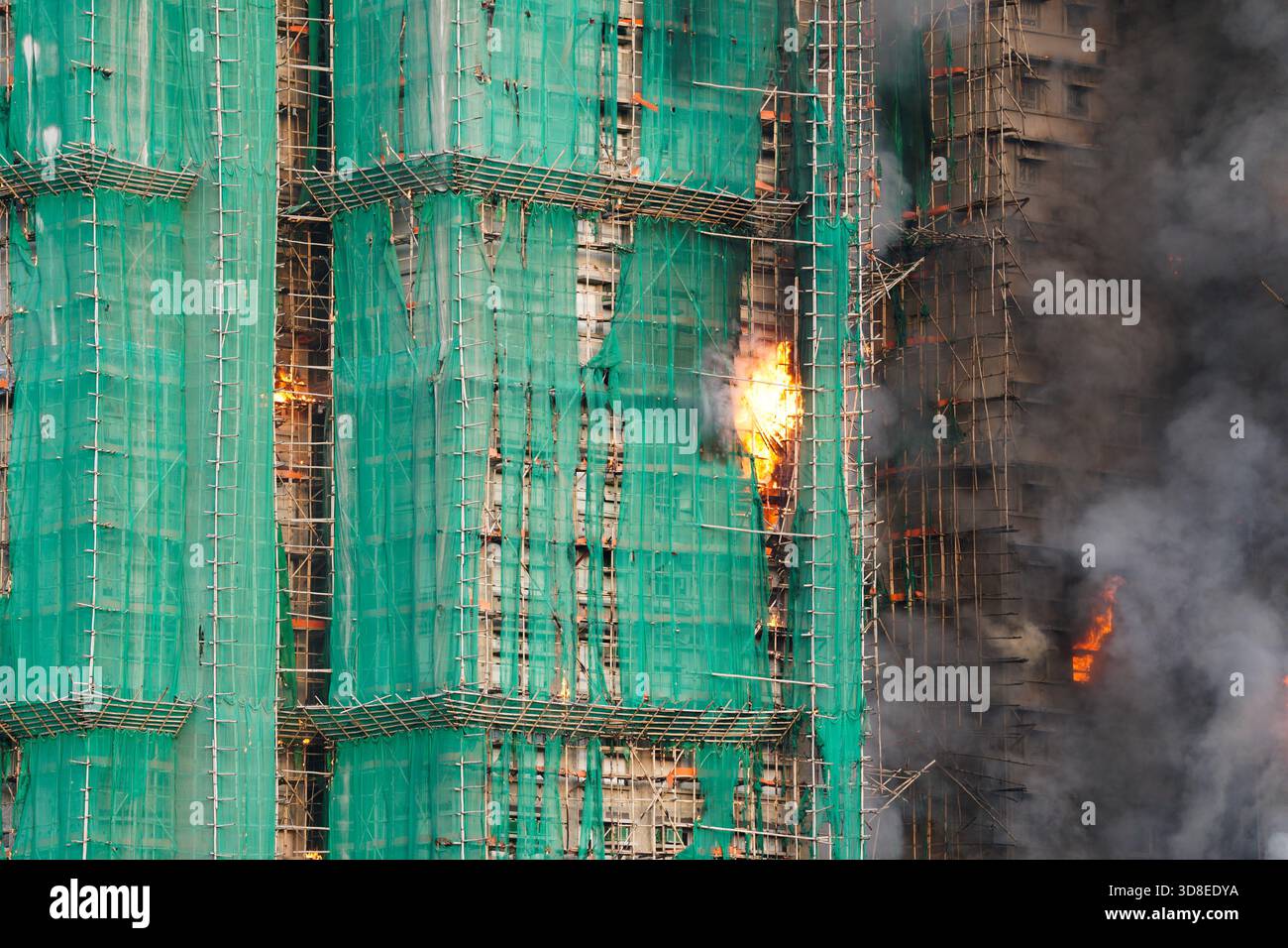 Smoke and flames rise as a major fire engulfs several residential ...