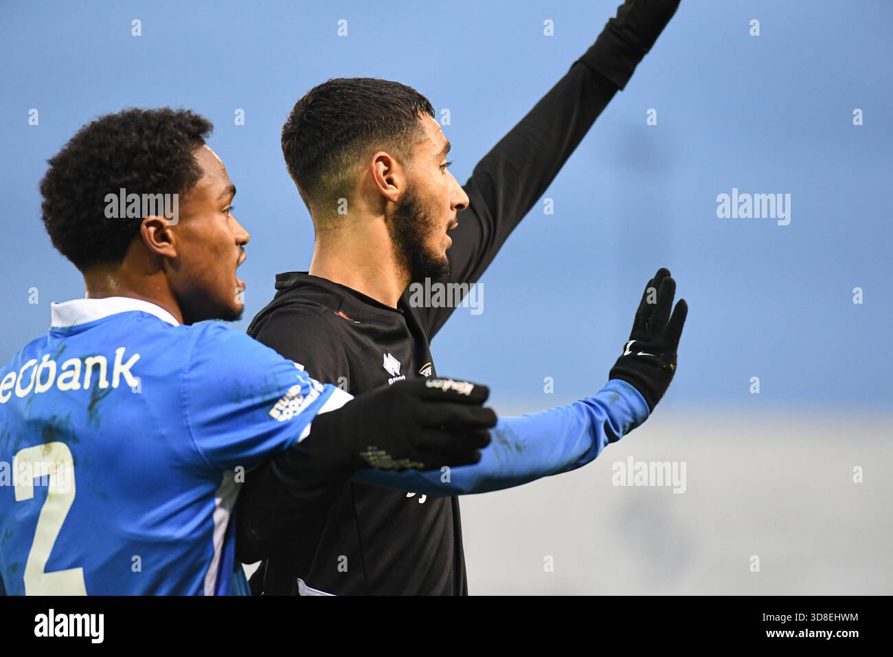 Jong Genk's Kayden Pierre and Olympic's Mohamed Medfai pictured in ...