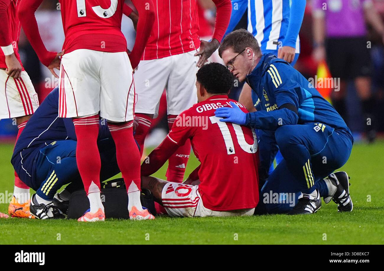 Nottingham Forest's Morgan Gibbs-White receives treatment before ...