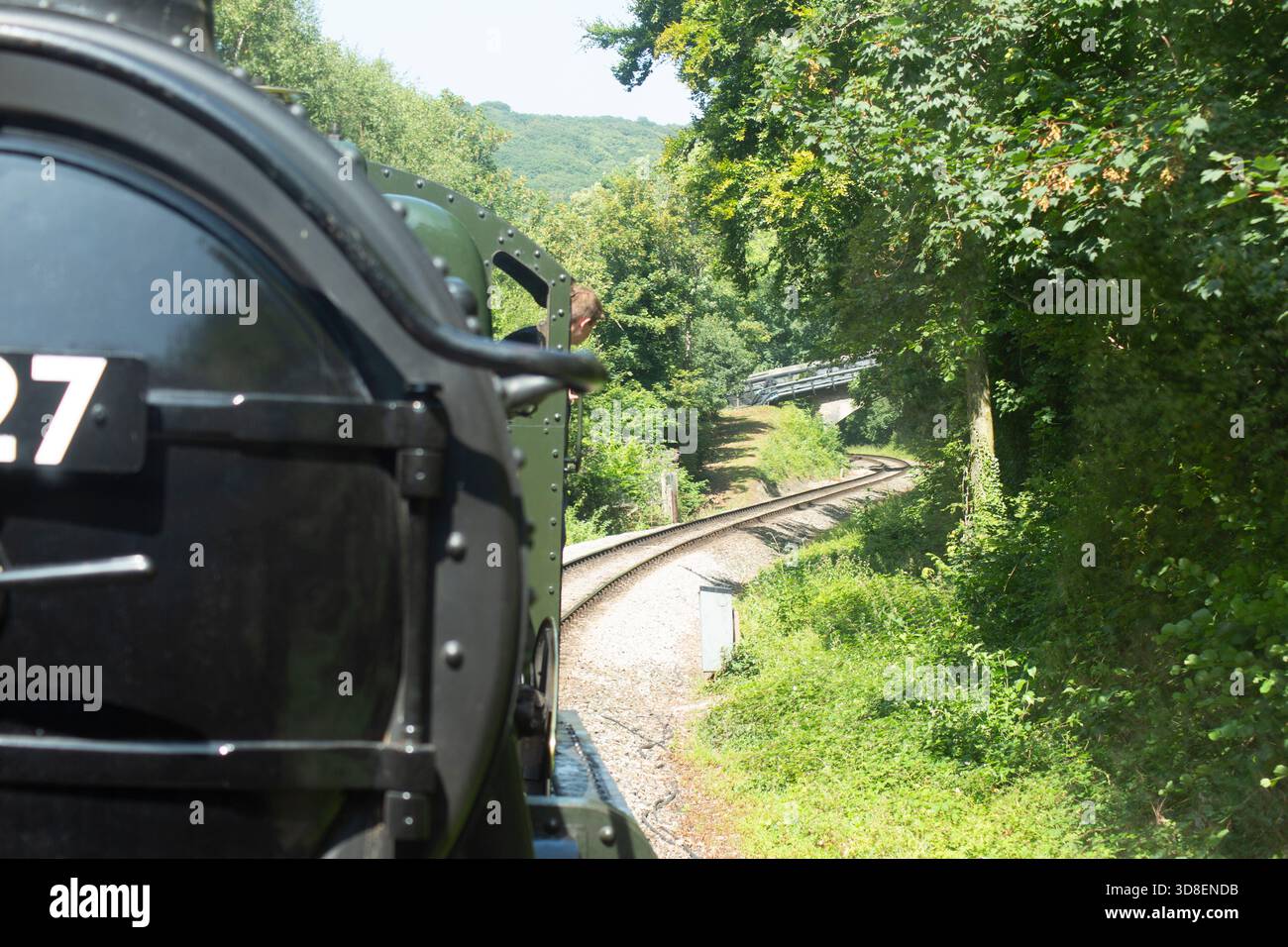 View from a heritage steam train following a curving railway line ...