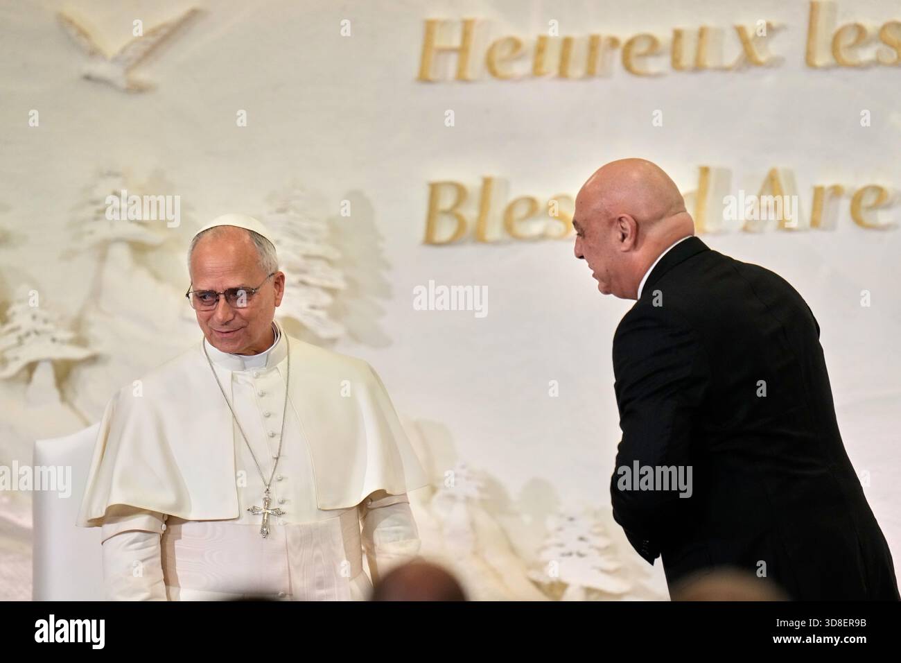 Lebanese President Joseph Aoun speaks to Pope Leo XIV during a ...