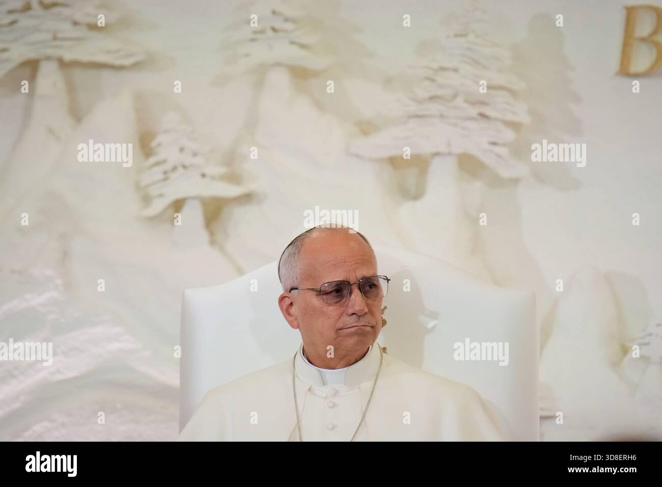 Pope Leo XIV listens to a speech by Lebanon's President Joseph Aoun ...