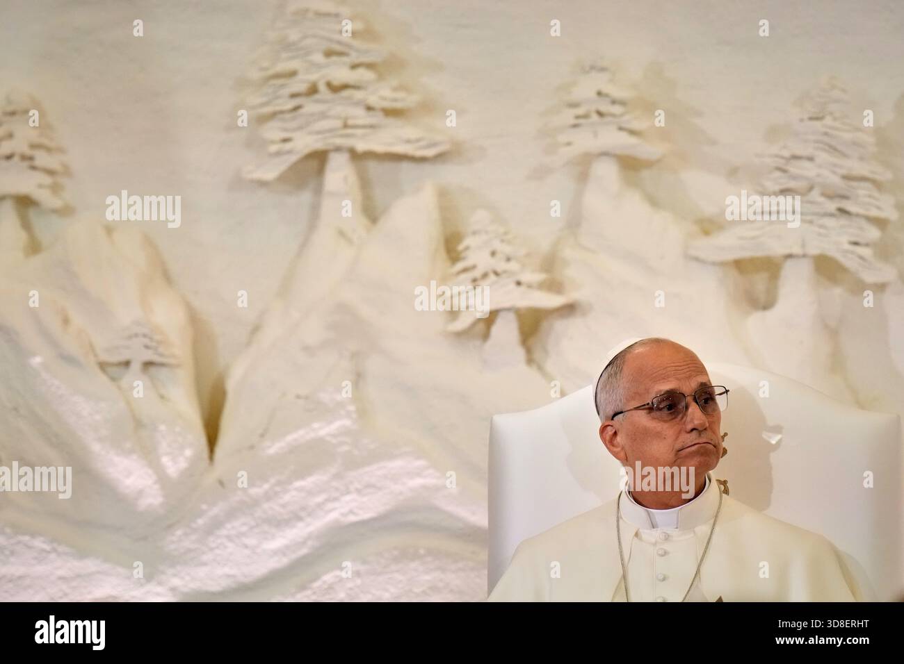 Pope Leo XIV listens to a speech by Lebanon's President Joseph Aoun ...