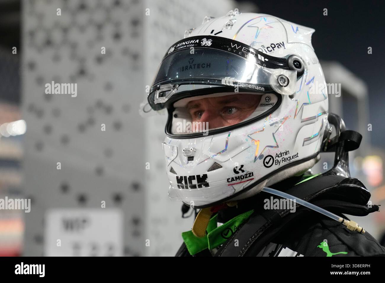 Kick Sauber driver Nico Hulkenberg of Germany walks back to his pits ...