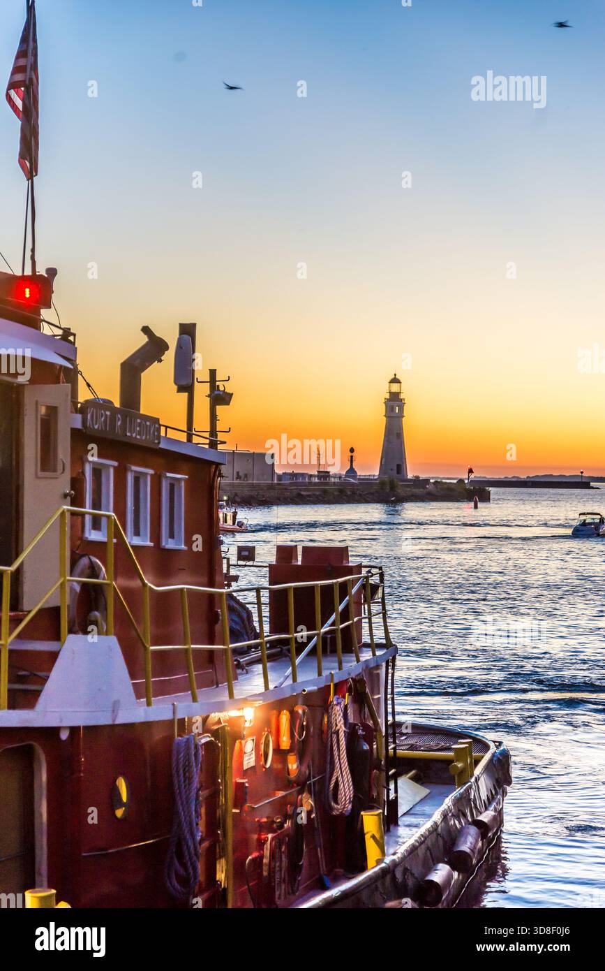 End of day for this tug boat docked along buffalo river Stock Photo - Alamy