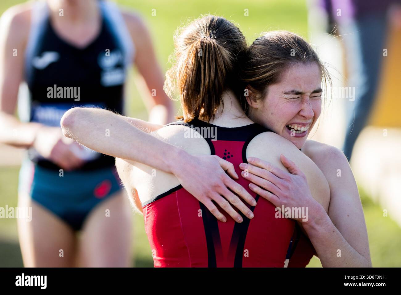 Laure Bilo and Belgian Marie Bilo celebrate as they crossed the finish ...
