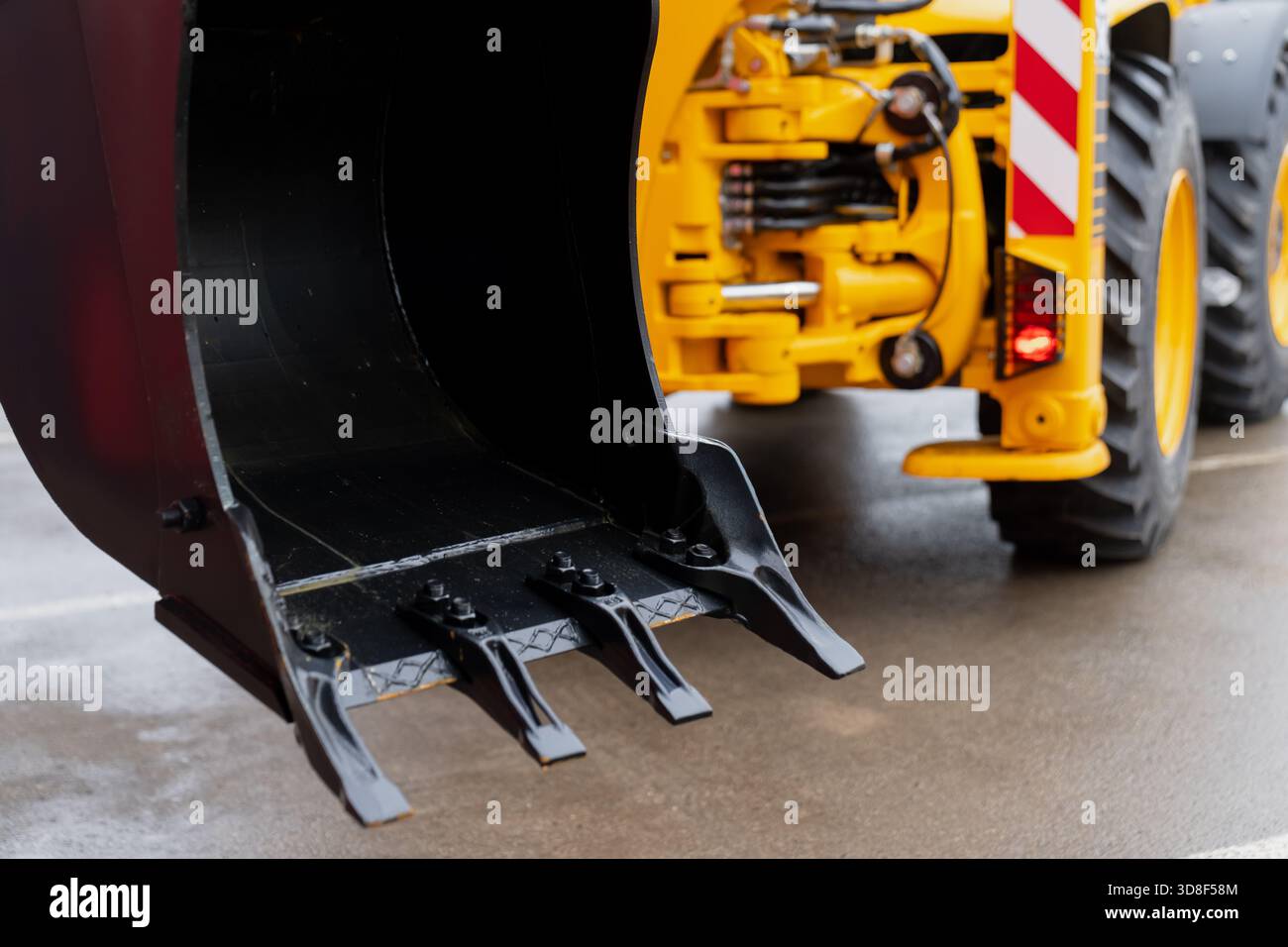 Industrial view of a heavy construction loader showing a steel digging ...