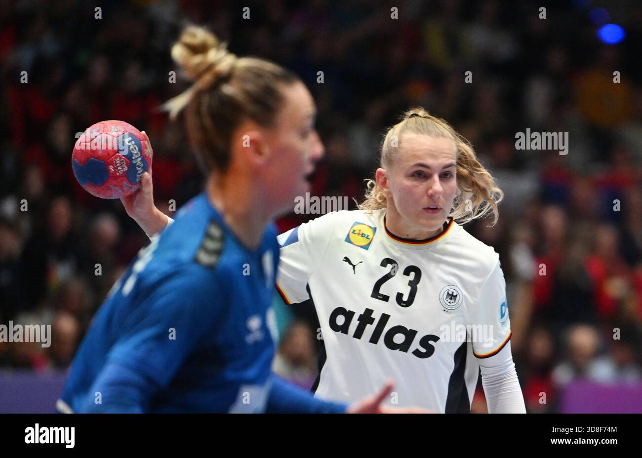 Germany's Annika Lott, right, in action with Serbia's Andela Janjusevic ...