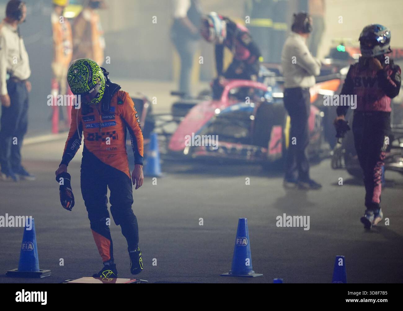 McLaren driver Lando Norris dejected after the Qatar Grand Prix at the ...