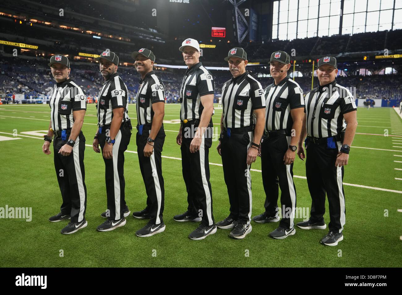 Officials, from left to right, field judge Dave Hawkshaw (107), line ...